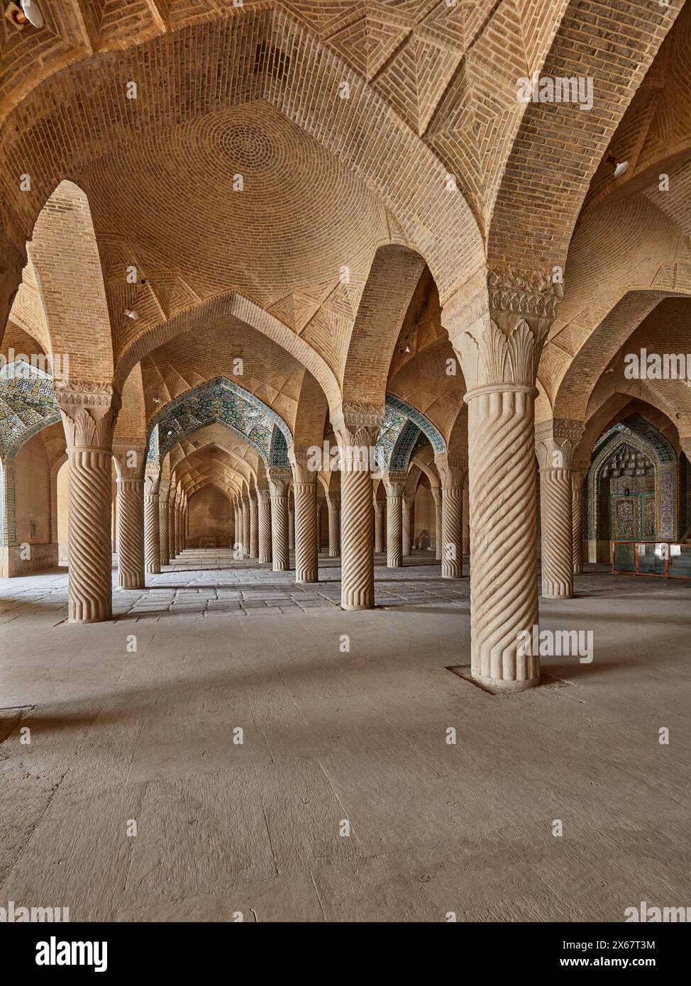 Interior view of central prayer hall with many pillars supporting roof ...