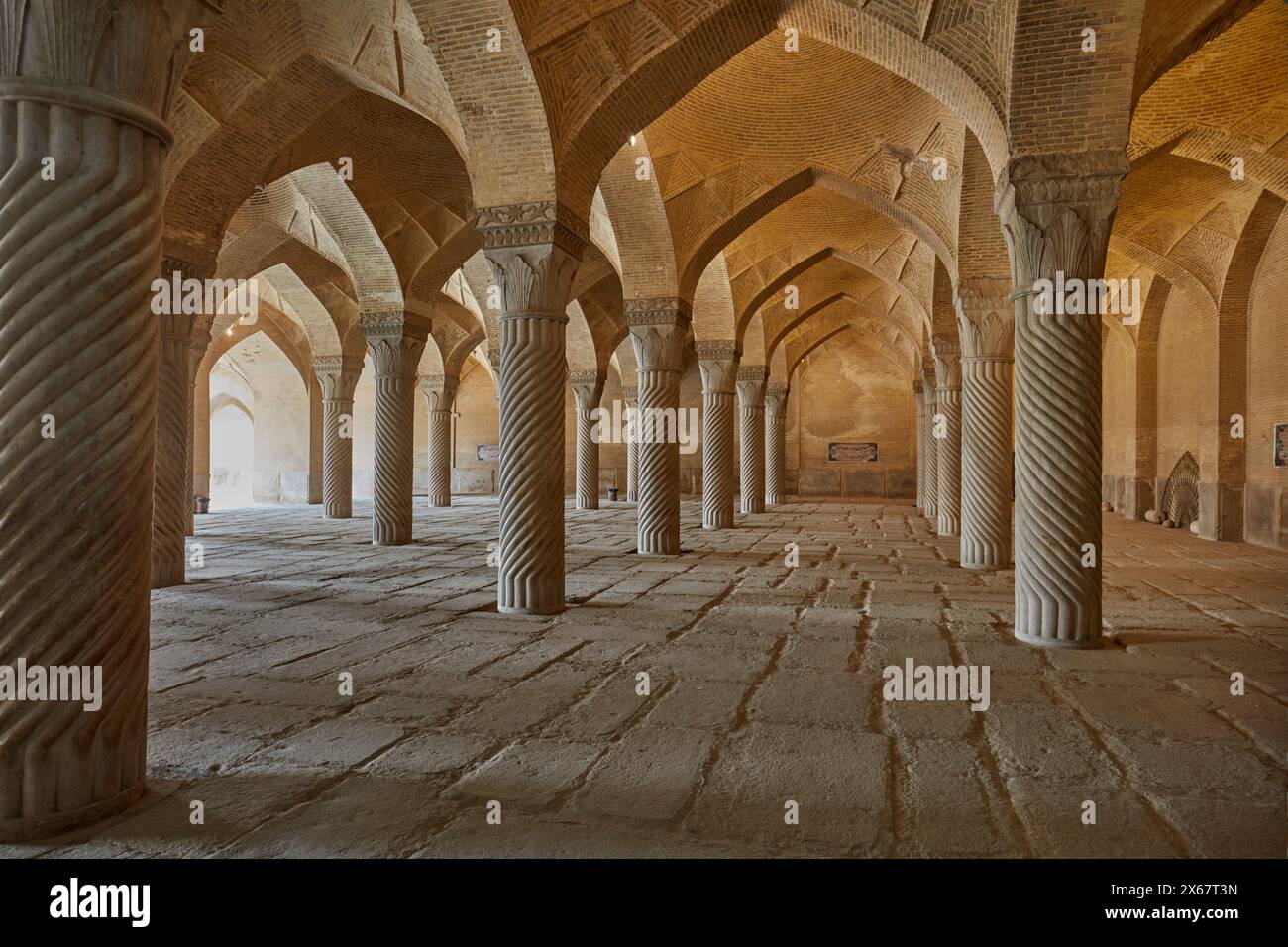 Interior view of central prayer hall with many pillars supporting roof of brick vaults in the ...
