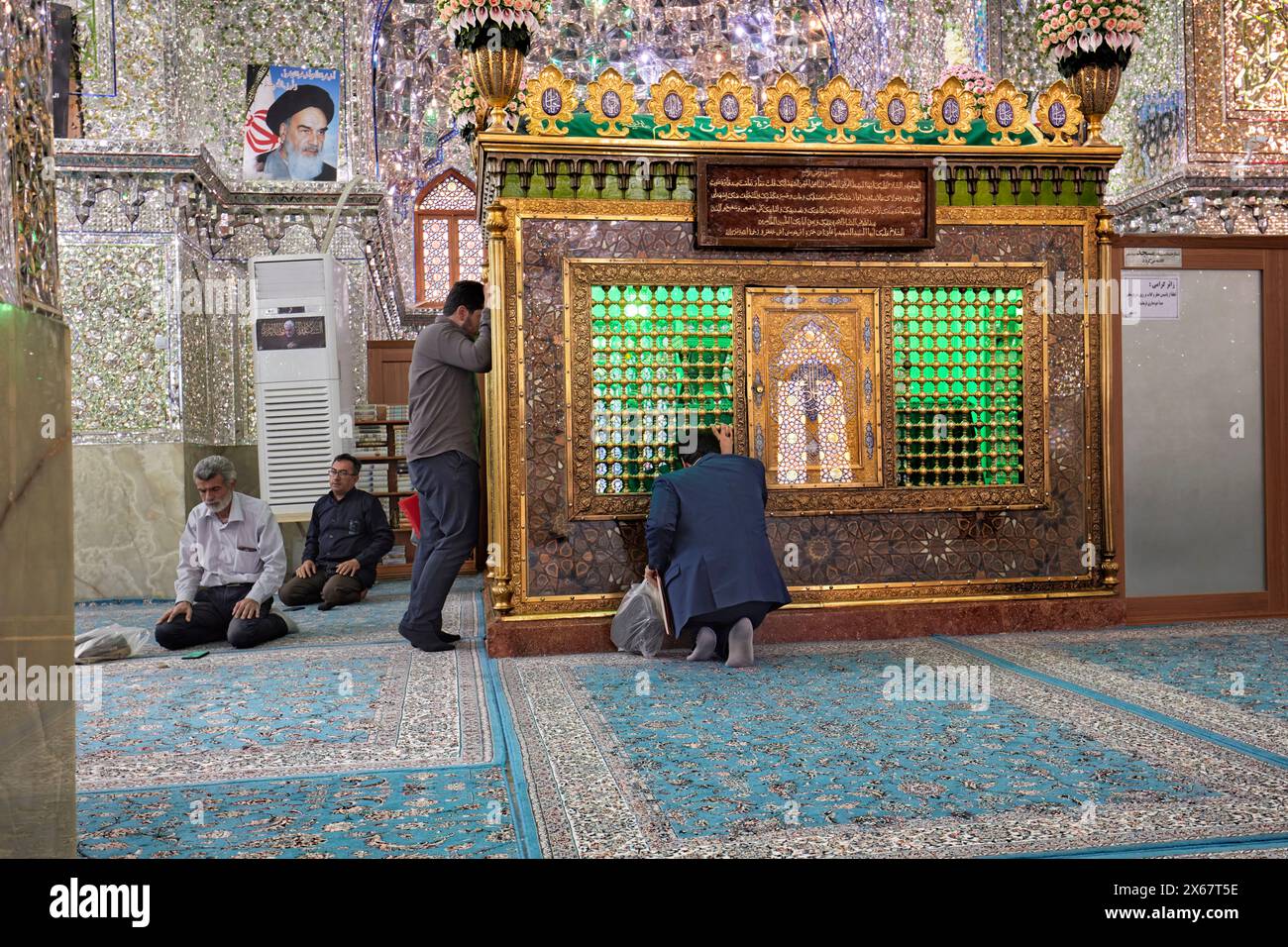 Men pray in the Ali Ibn Hamzeh Holy Shrine. Shiraz, Iran Stock Photo ...