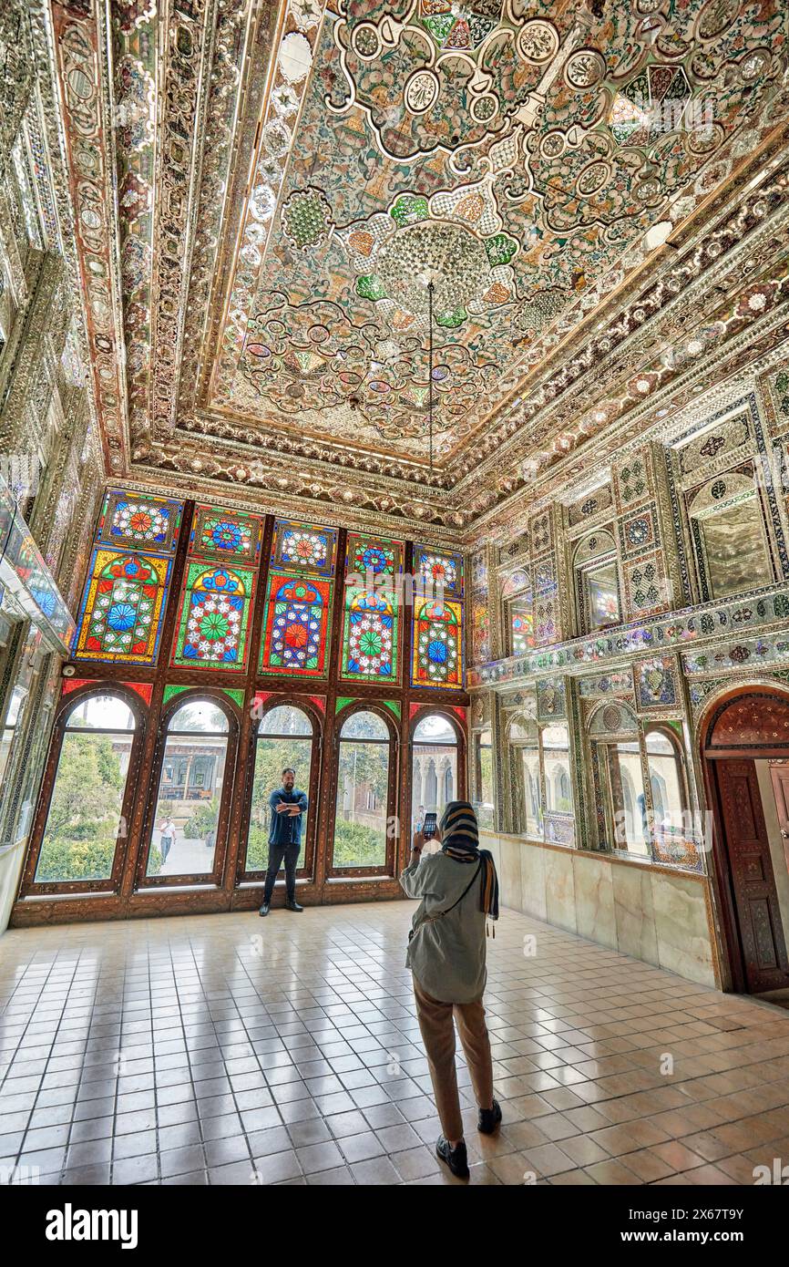 Tourists take pictures inside the Zinat Al-Molk Historical House, 19th ...