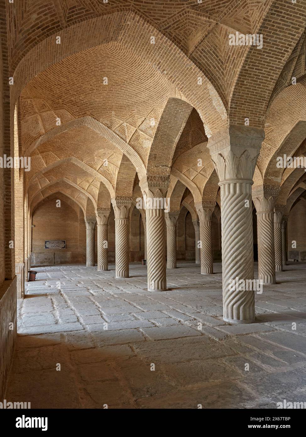 Interior view of central prayer hall with many pillars supporting roof ...