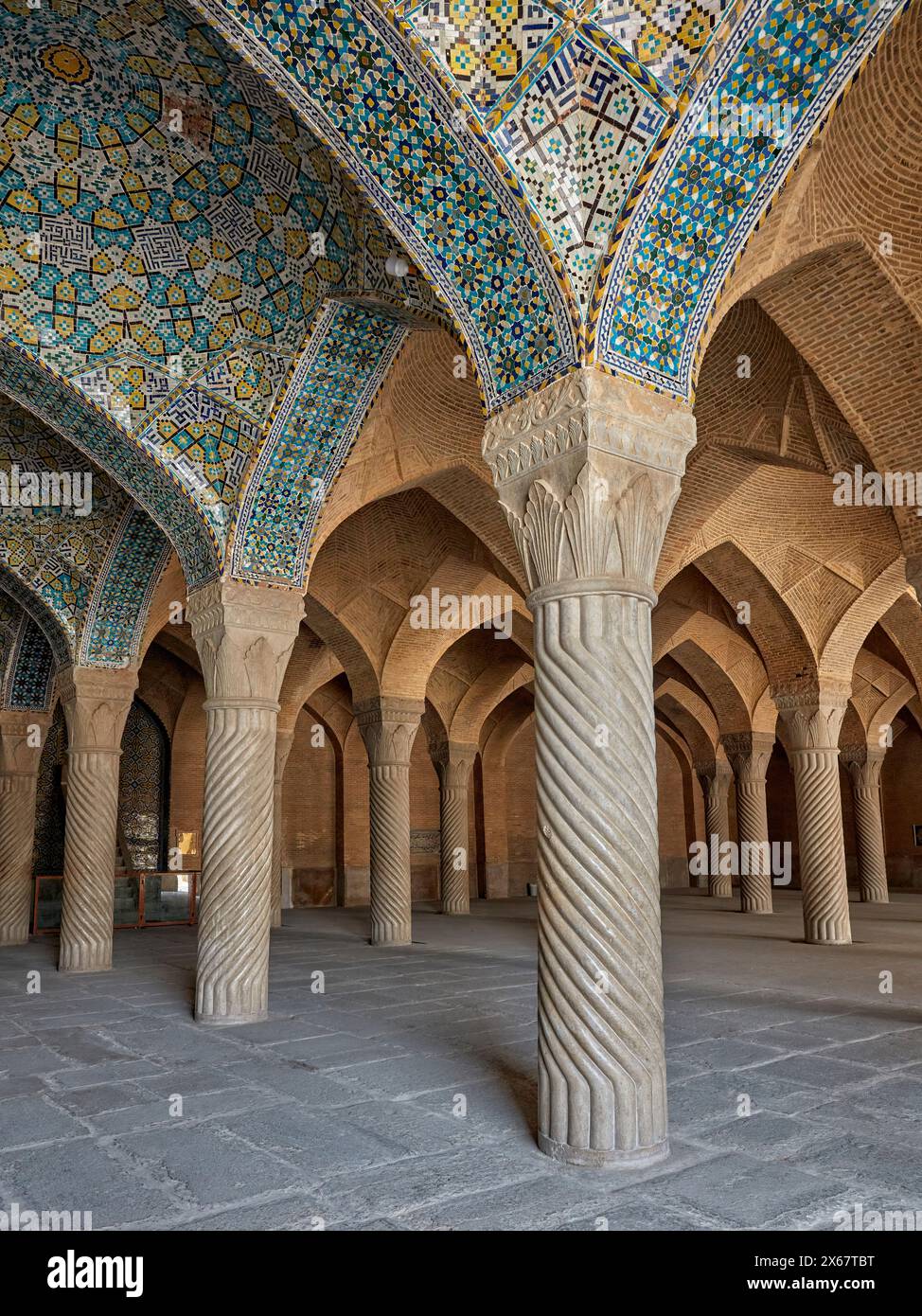 Interior view of central prayer hall with many pillars supporting roof ...