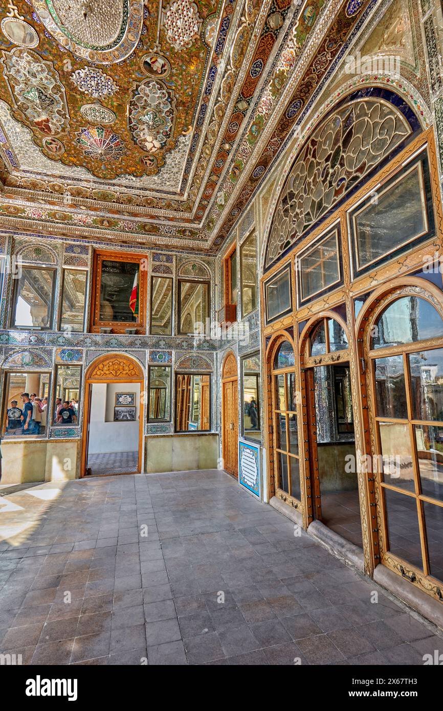 Veranda with elaborate mirror tiling on walls and ceiling in Qavam ...