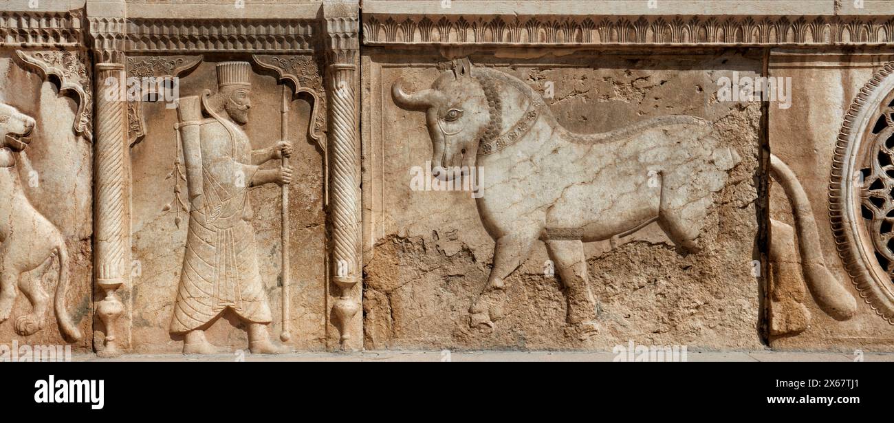 Relief depicting an ancient Persian warrior and a bull in Qavam House ...