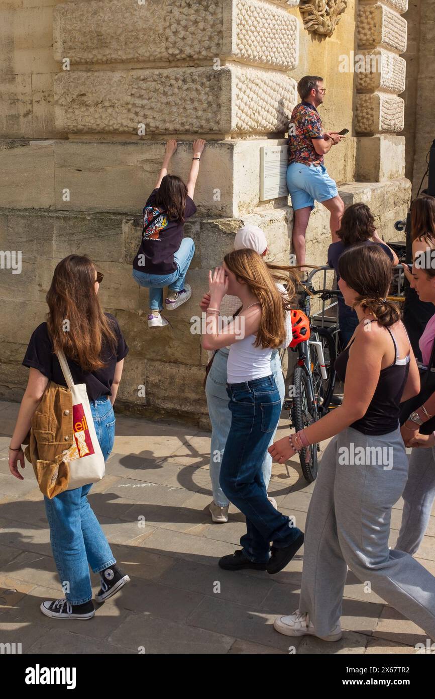 Montpellier, France. 13 May 2024. People climbing the Arch of Triumph ...