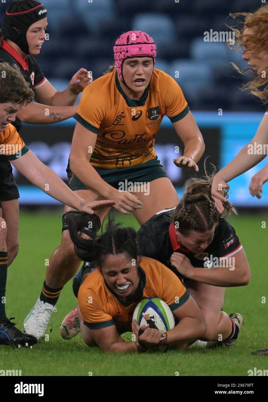 Sydney, Australia. 11th May, 2024. Claire Gallagher (center) of Canada ...