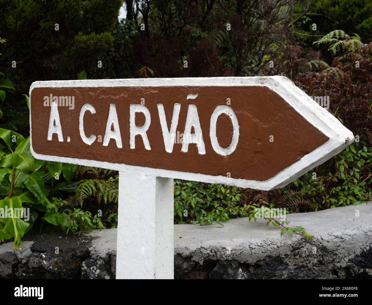 sign to Algar do Carvao (Cavern of Coal) is an ancient lava tube or ...