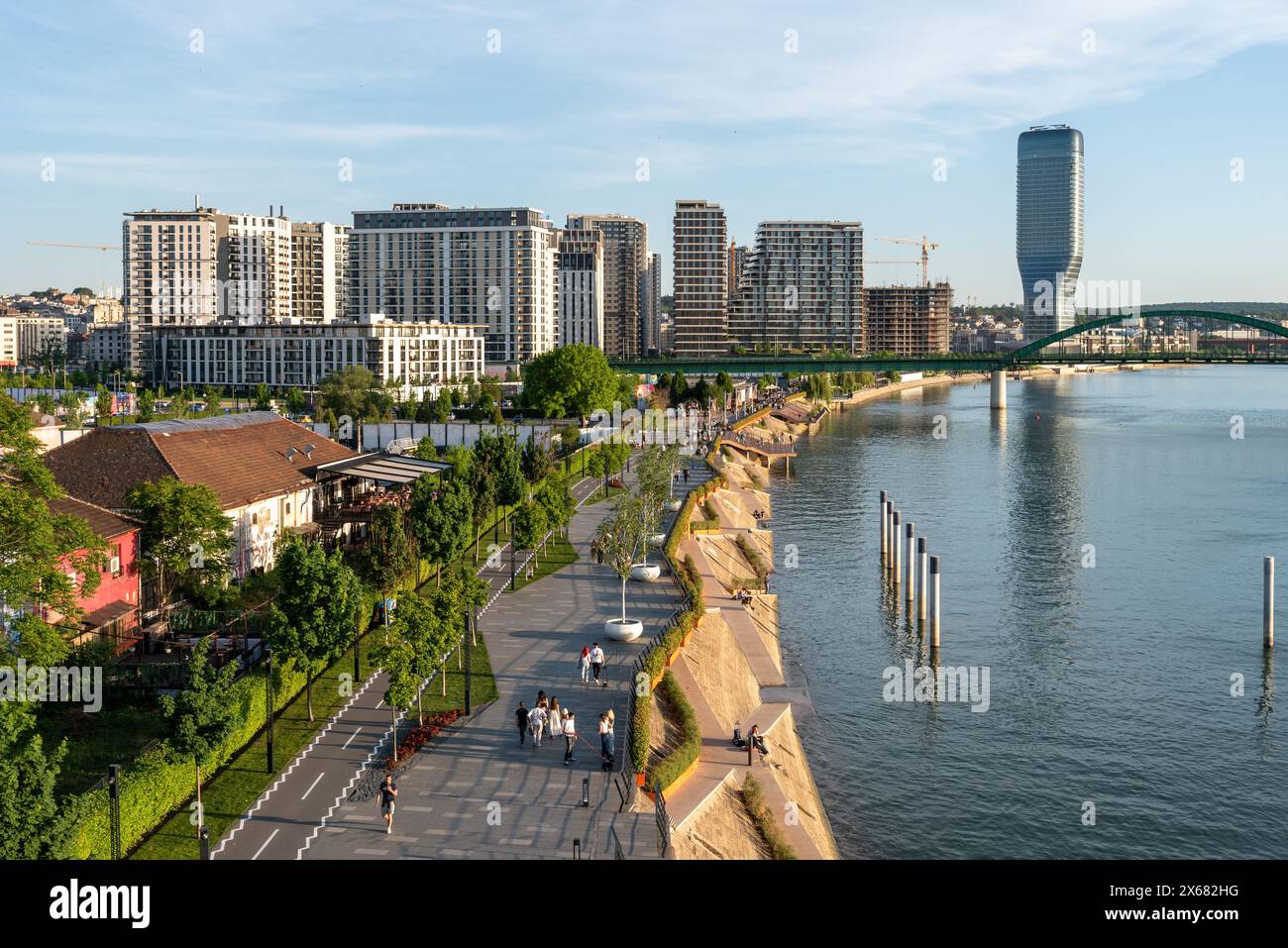 Promenade on Belgrade waterfront in the warm evening light. April 2024 ...