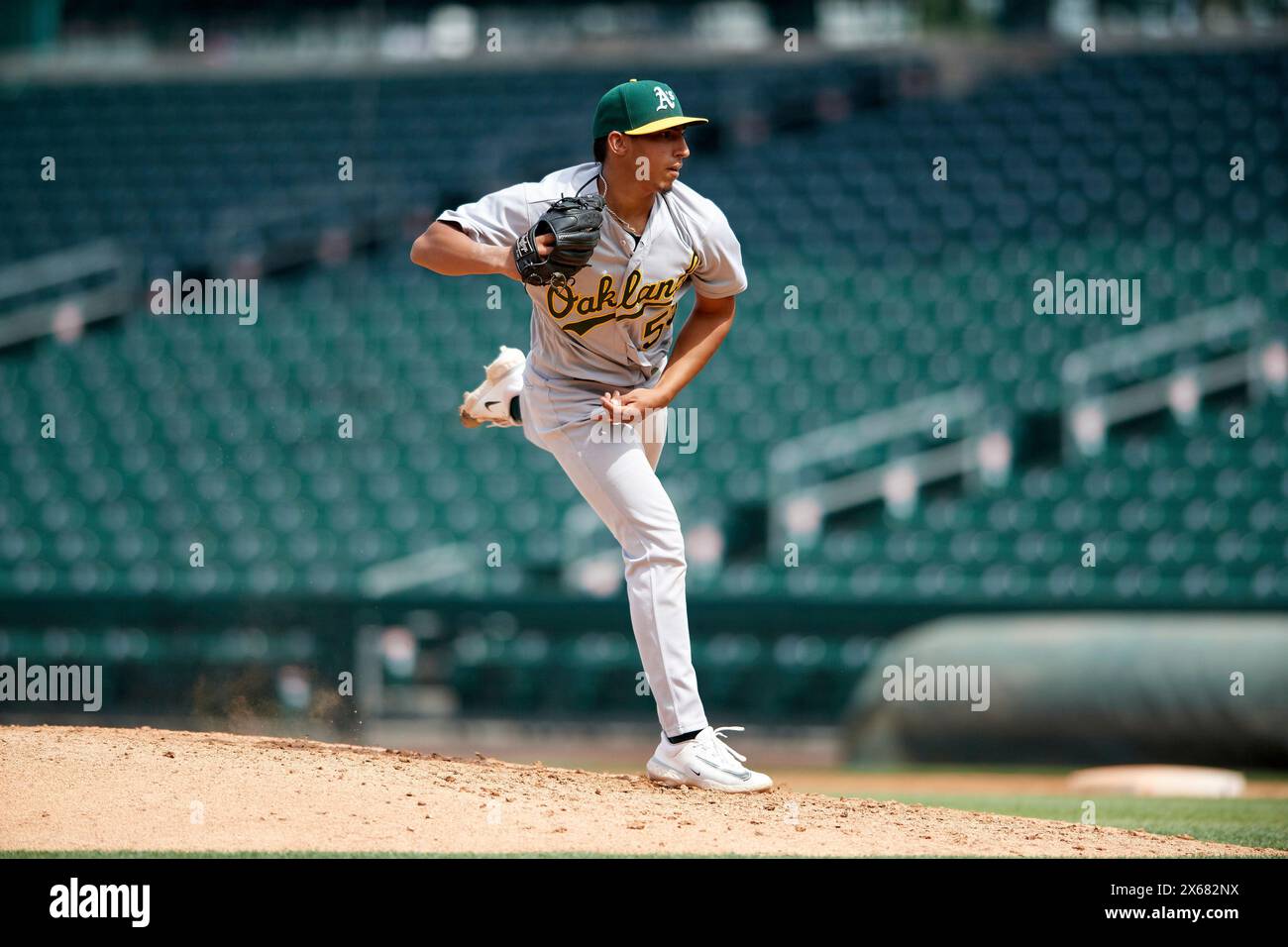 Oakland Athletics pitcher Derek Corro (53) delivers a pitch during an ...