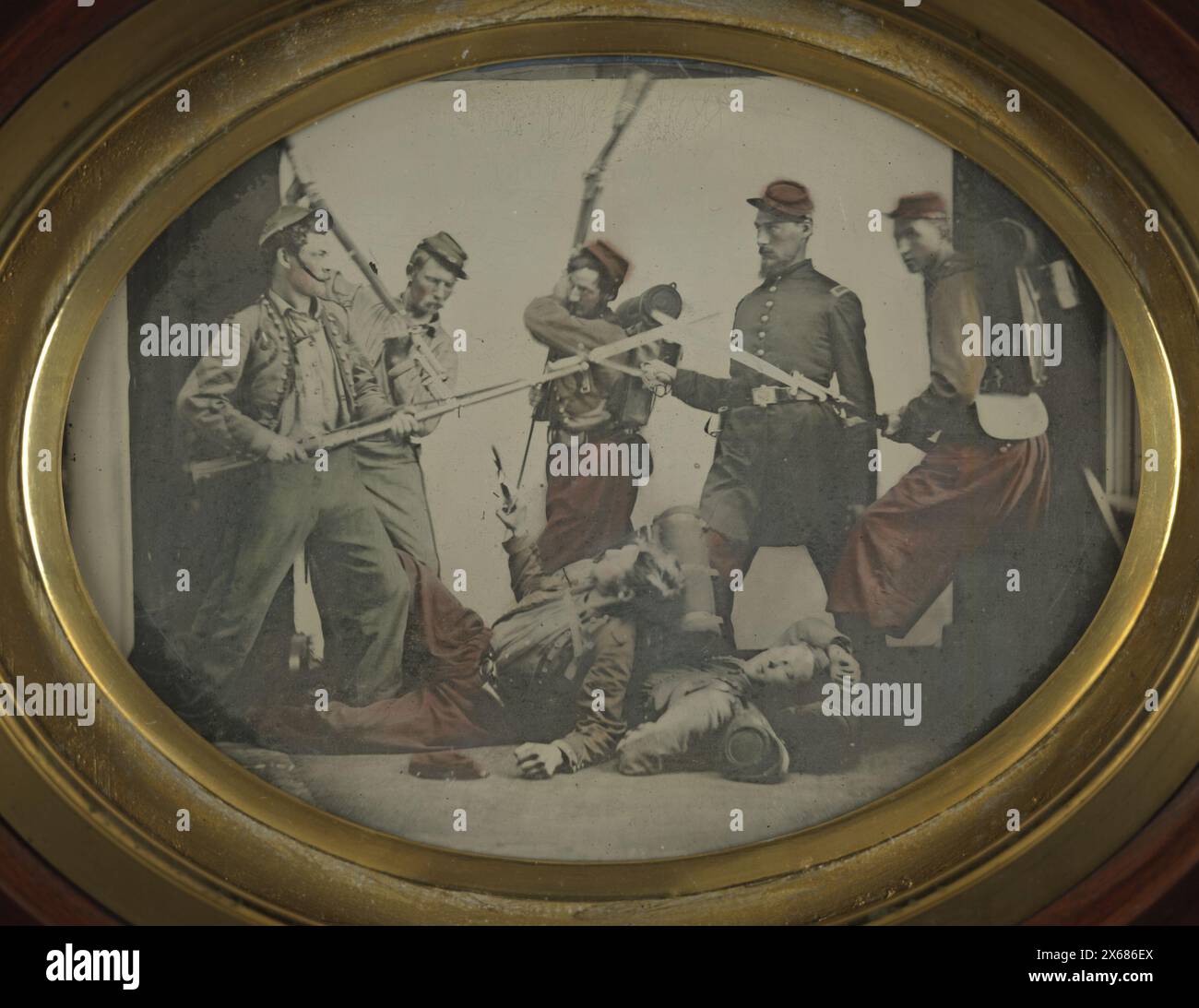 Seven unidentified soldiers in Union uniforms reenacting a battle scene ...
