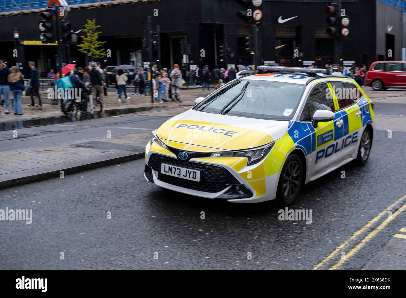 Metropilitan Police car passing at speed on 6th May 2024 in London ...