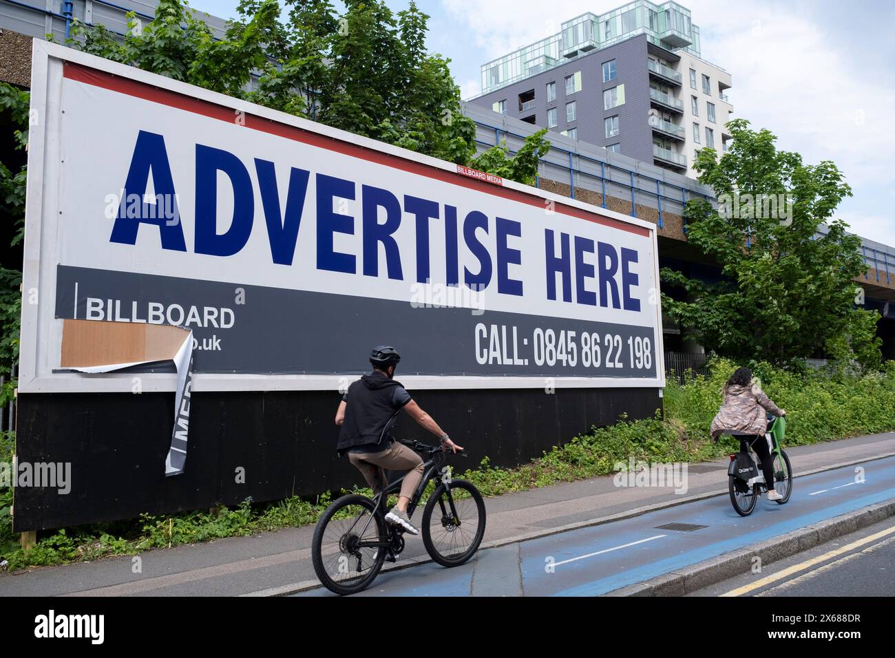 Large scale advertising billboard poster which reads Advertise here to ...
