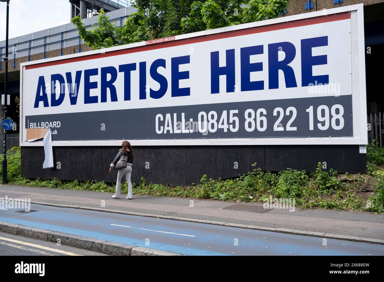 Large scale advertising billboard poster which reads Advertise here to ...