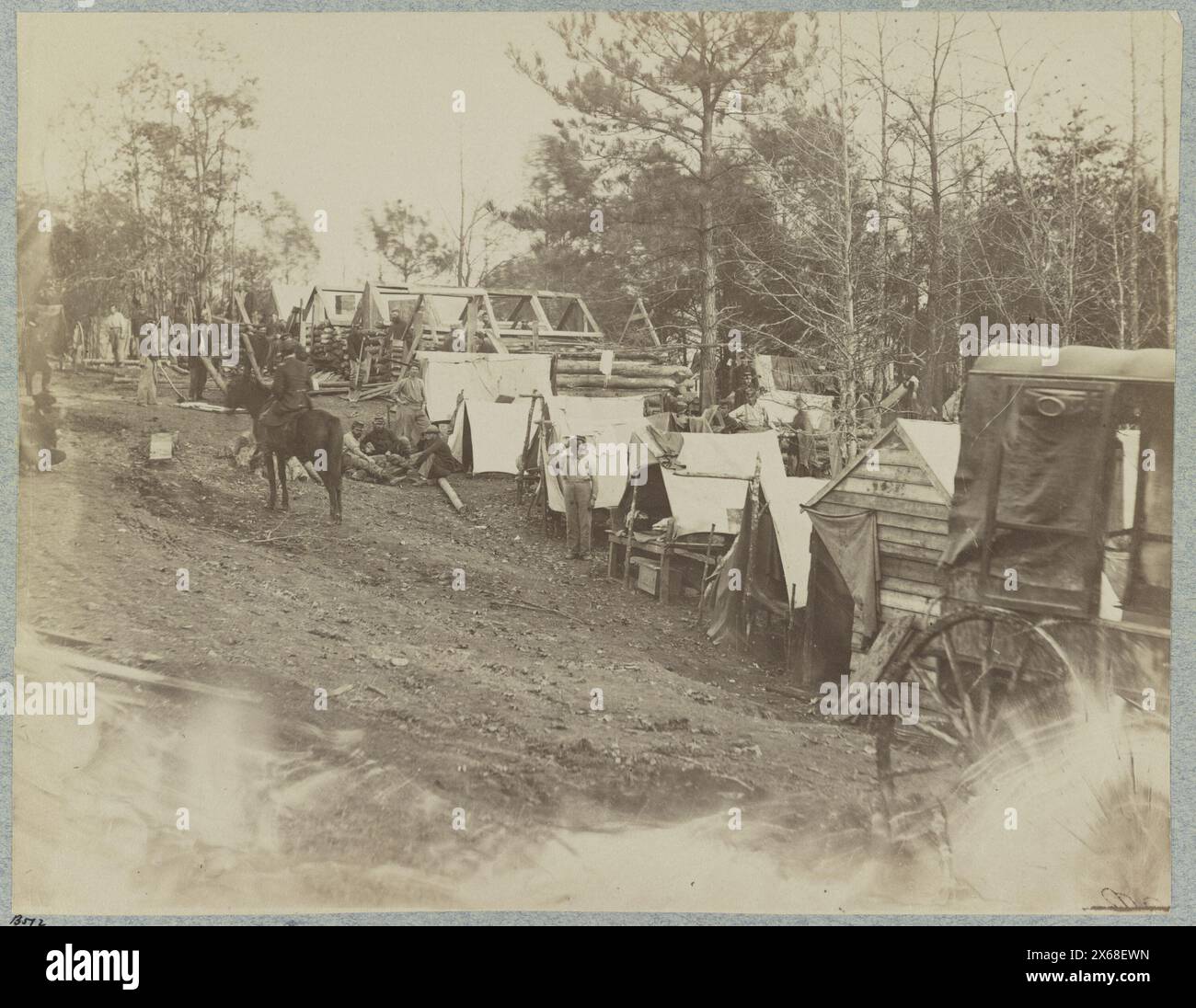 Building winter quarters at Fort Brady, James River, Va. near Dutch Gap ...