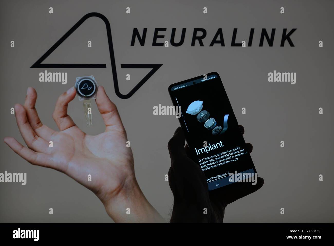 The Neuralink web site is displayed on a smartphone with Neuralink logo ...