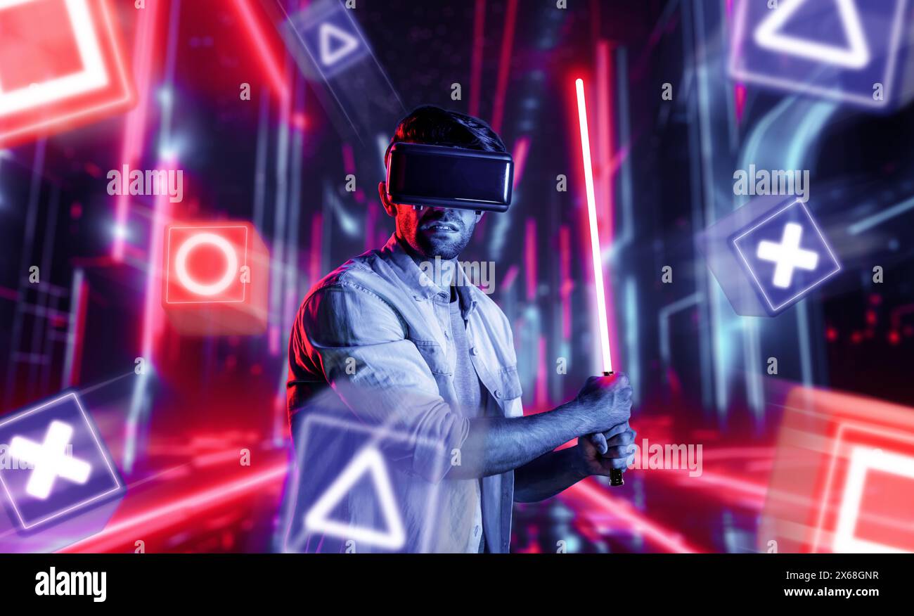 Energetic man with VR glasses fencing neon sword with music block ...