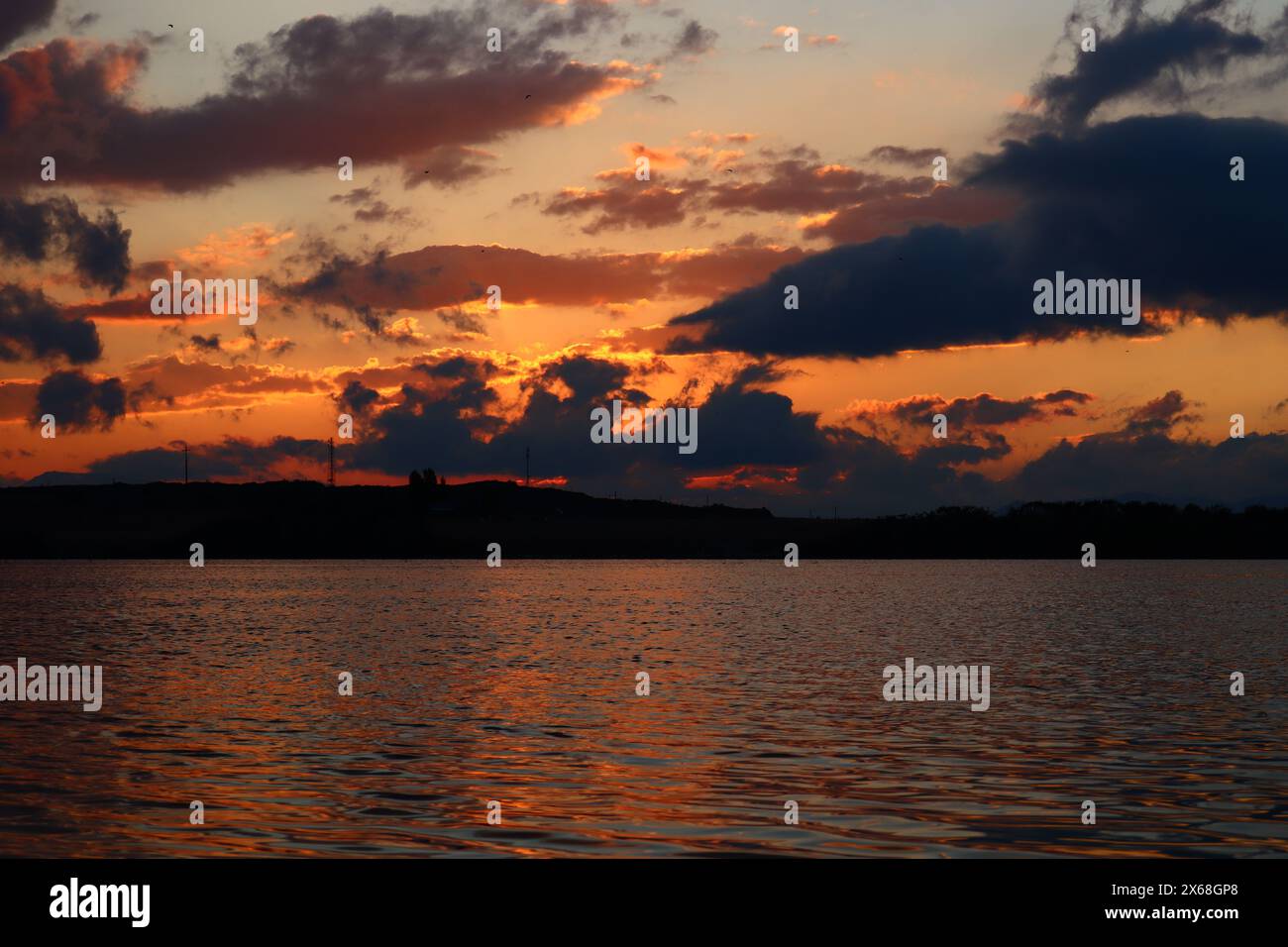 sunset colors reflection on water Stock Photo - Alamy