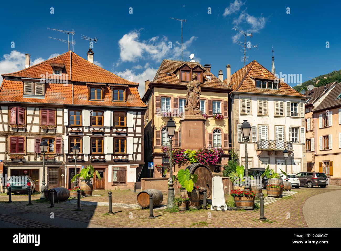 The square 'Place de la Sinne' and Friedrichsbrunnen with statue 'Ville ...