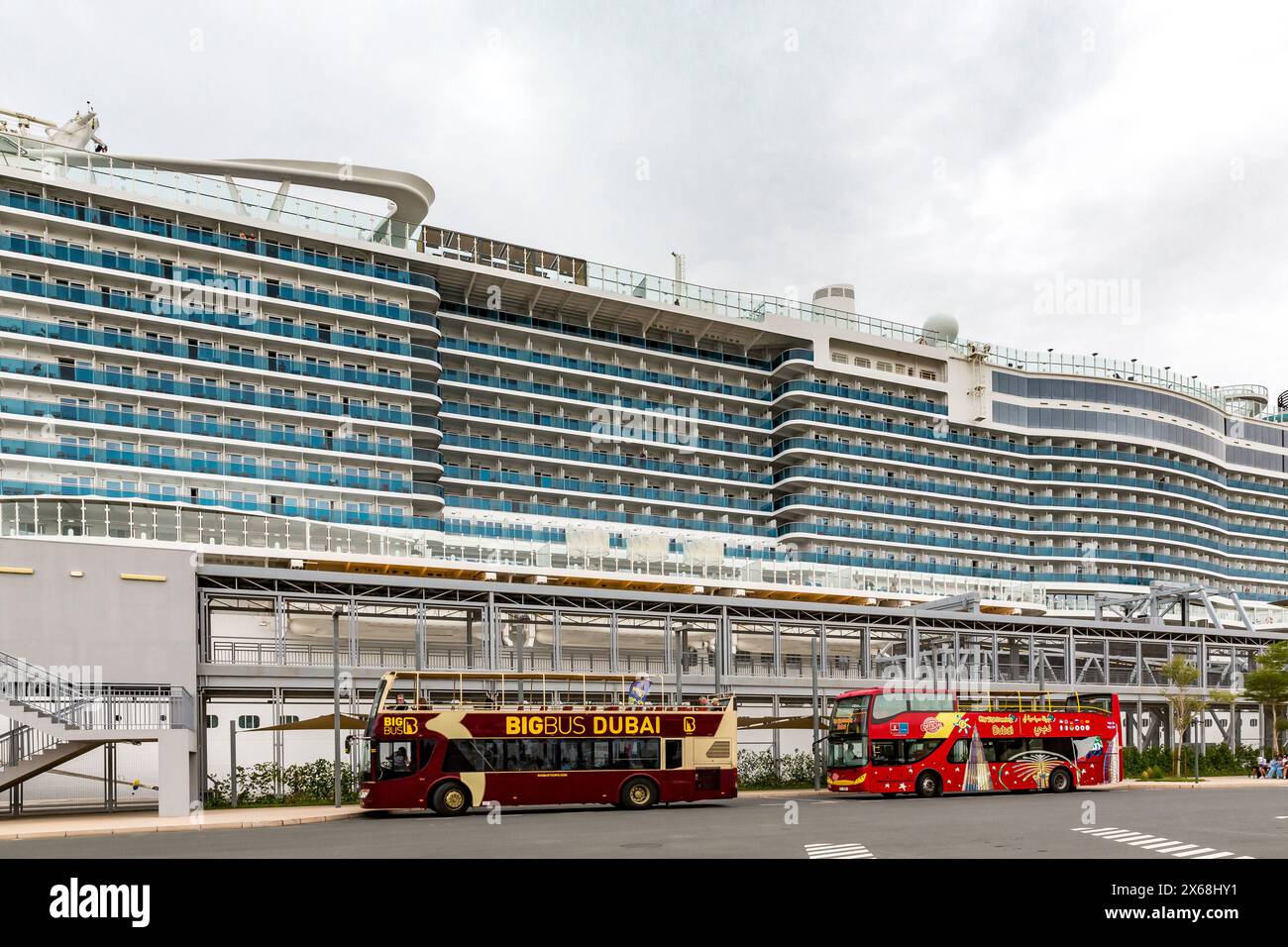 Hop on hop off buses waiting for tourists, cruise ship in the harbor ...