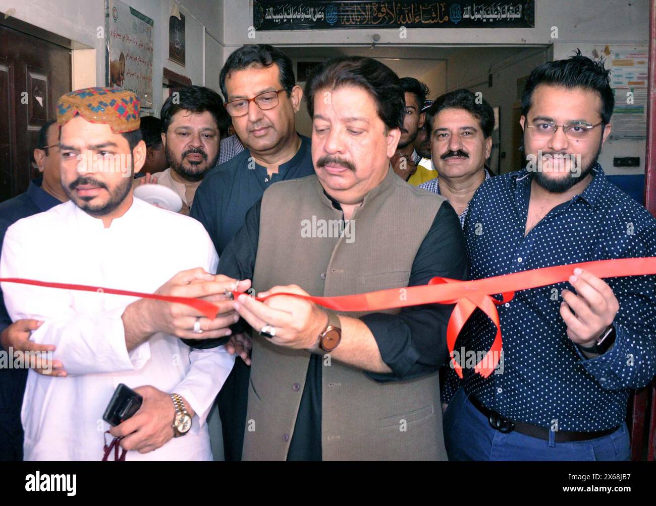 District Health Officer Dr. Lala Jaffar cuts ribbon during inauguration ...