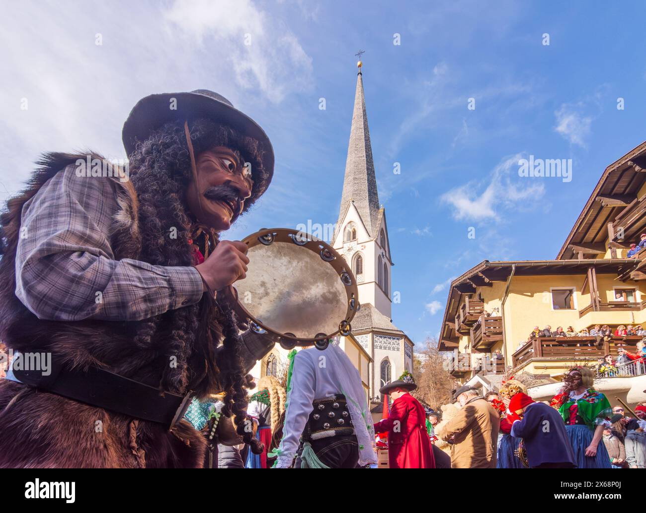 Imst, Imster Schemenlaufen (carnival), church Imst in background ...