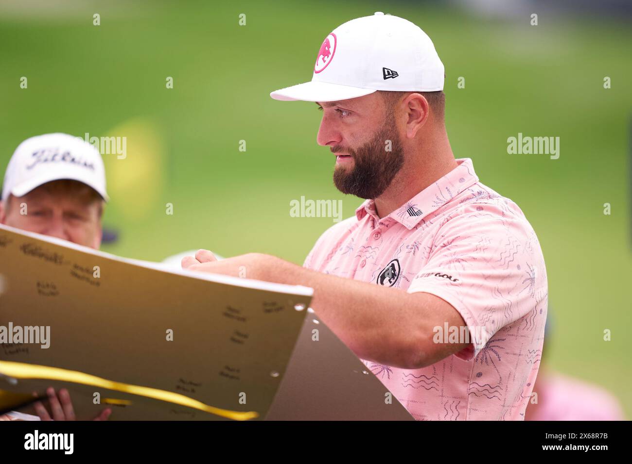 Jon Rahm of Spain signs autographs prior to the 2024 PGA Championship ...