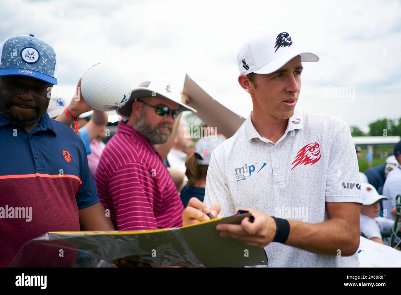 David Puig of Spain signs autographs prior to the 2024 PGA Championship ...