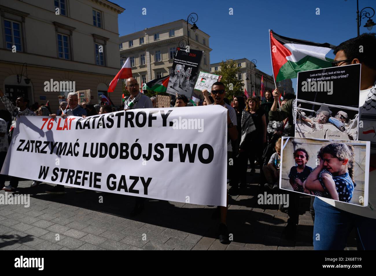 Solidarity With Palestine Rally In Warsaw. People carry a banner that ...