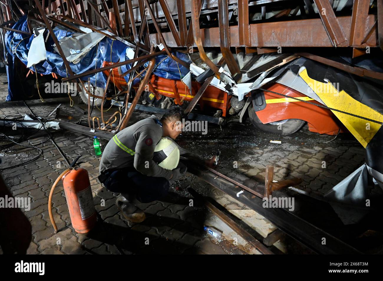 MUMBAI, INDIA - MAY 13: Ongoing rescue operation held by Mumbai Fire ...