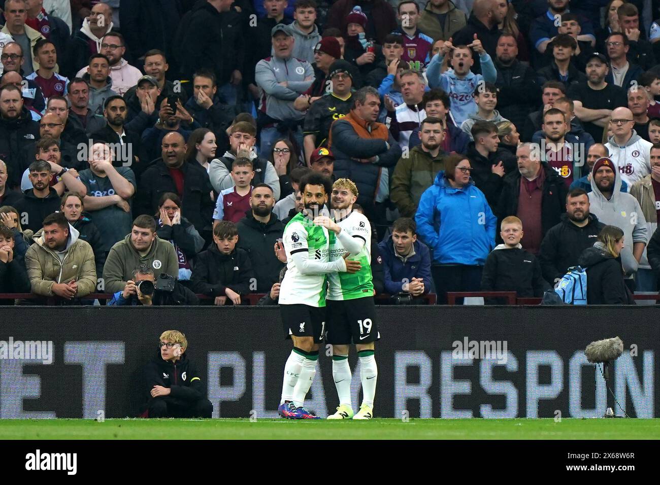 Liverpool's Mohamed Salah and Harvey Elliott celebrate their side's ...