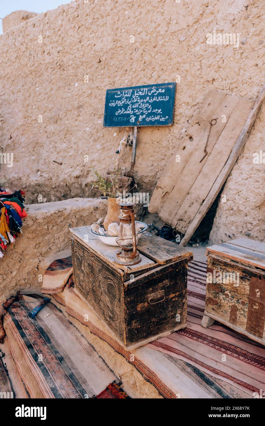 Traditional Siwa Oasis setup with Arabic sign and vintage items, Egypt ...