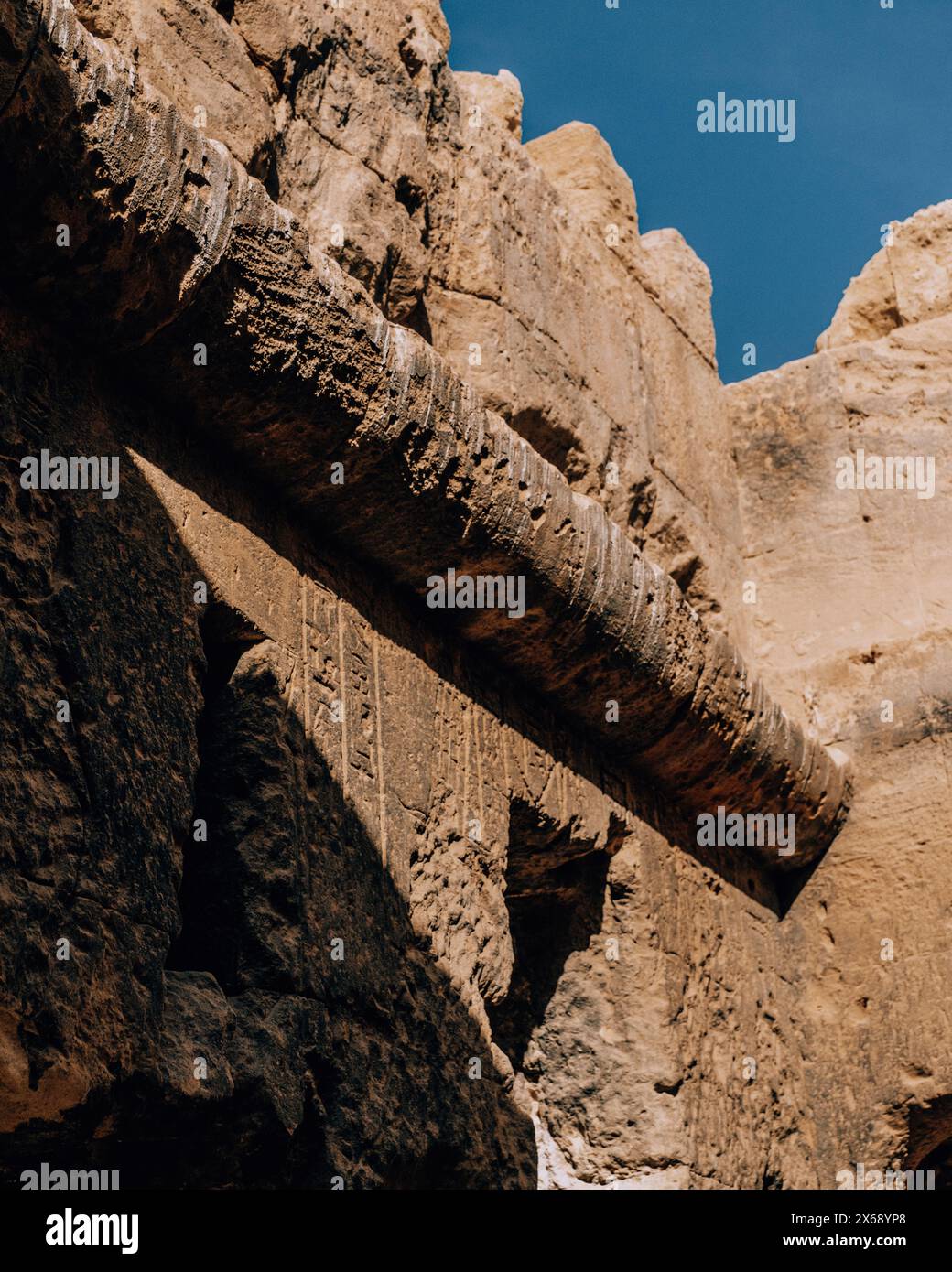 Close-up of ancient carvings and stonework at the Oracle Temple, Siwa ...