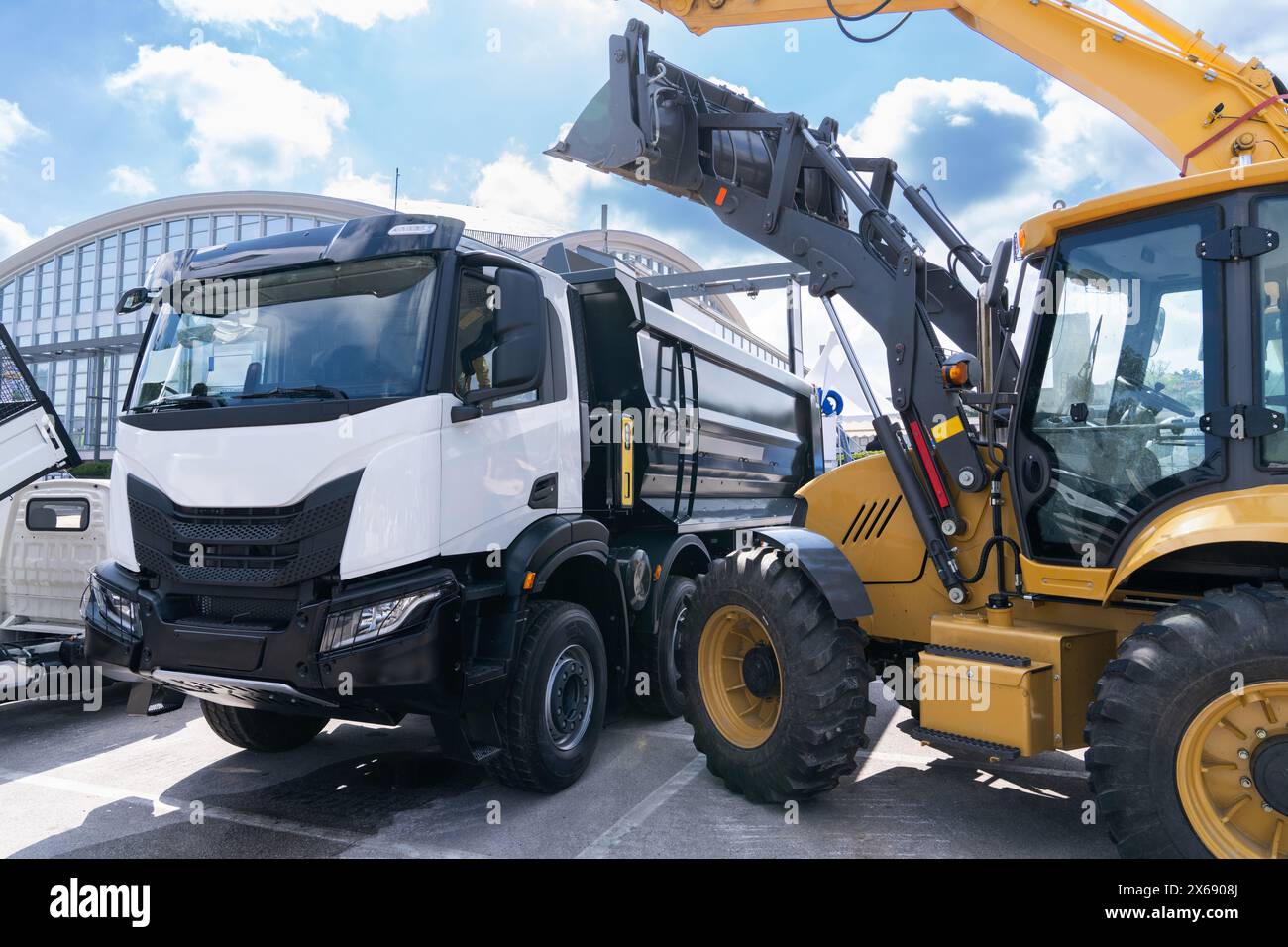 Heavy construction machines during a work Stock Photo - Alamy