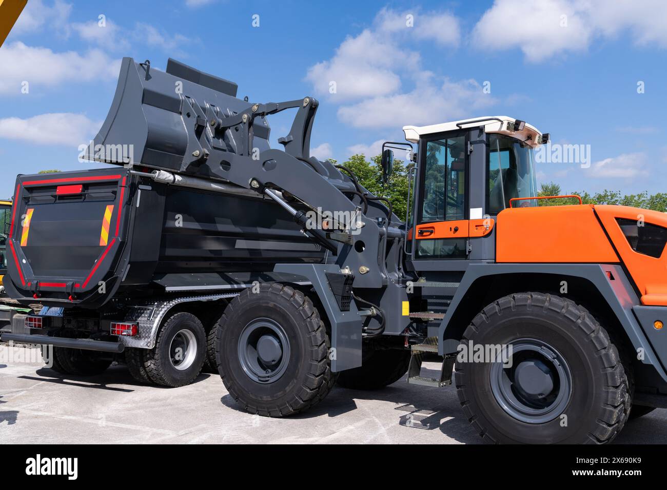 Heavy construction machines during a work Stock Photo - Alamy