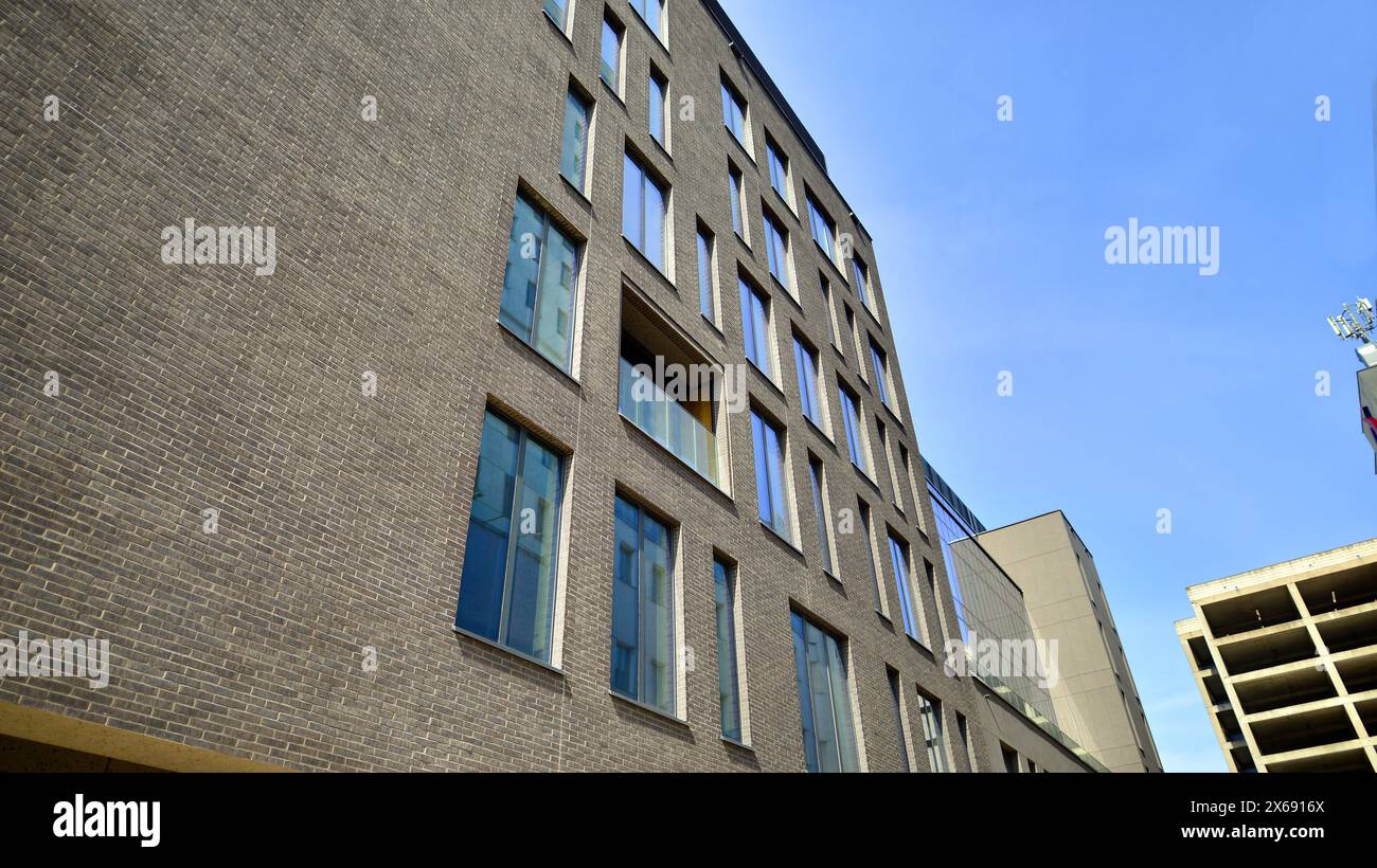 Modern office building detail. Perspective view of geometric angular ...