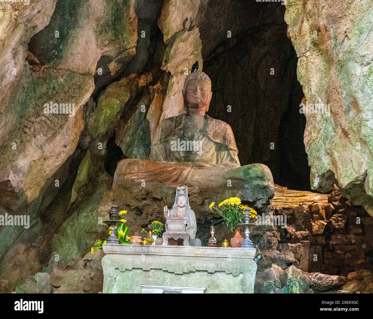 Buddha in Cave Temple Stock Photo - Alamy