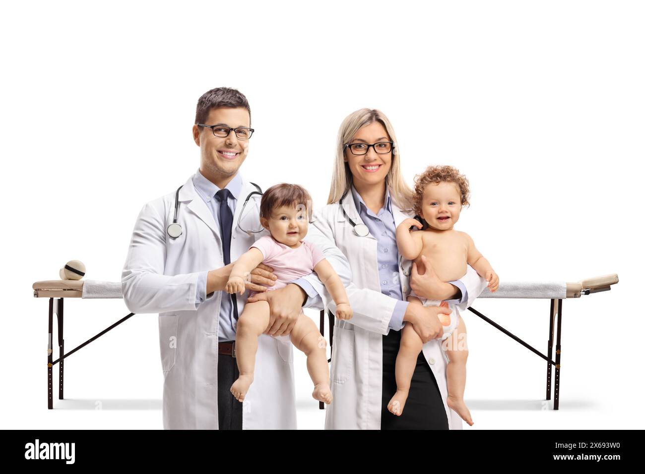 Pediatric doctors with babies in a clinic isolated on white background ...