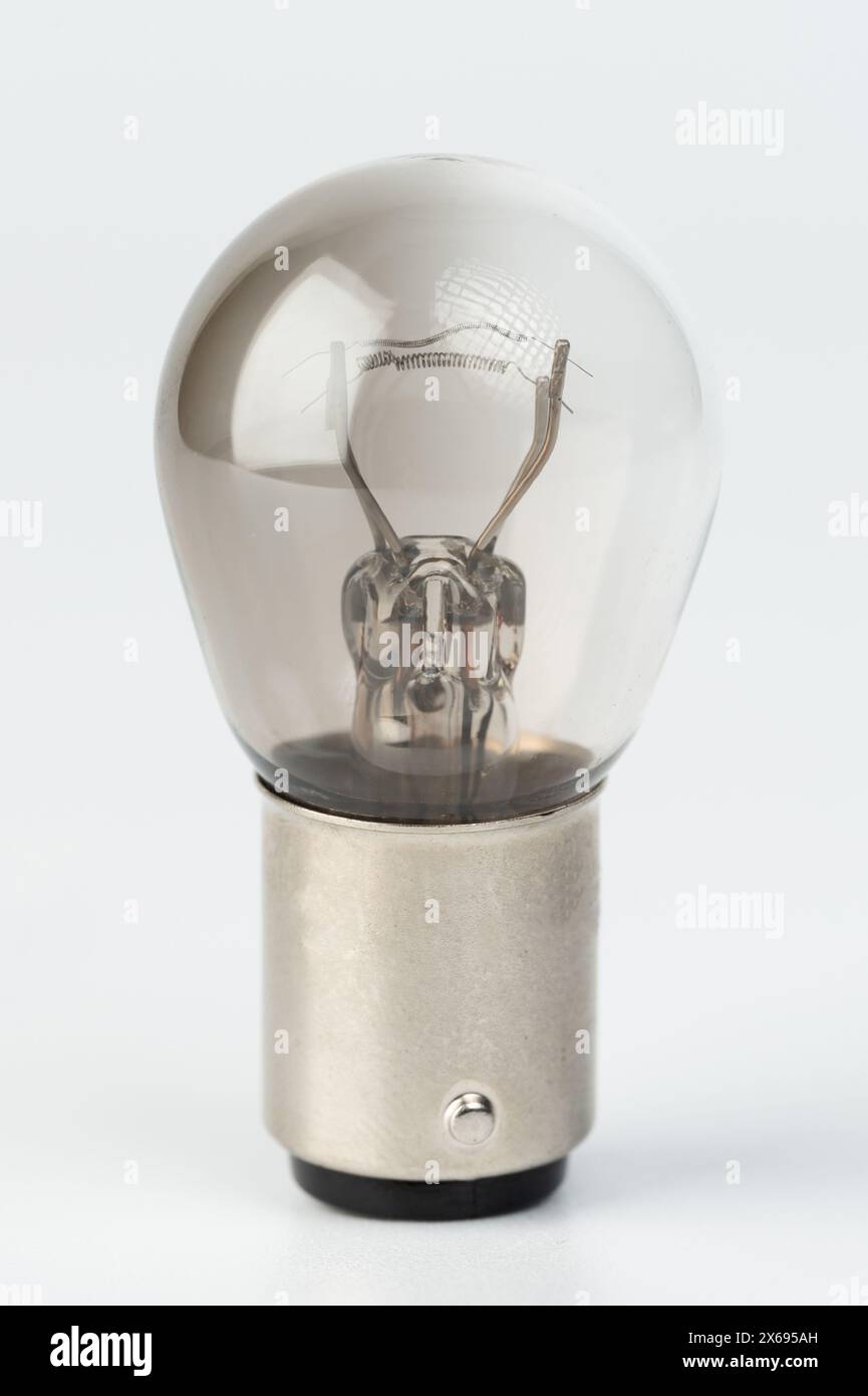 Small light bulb isolated on white studio background Stock Photo - Alamy