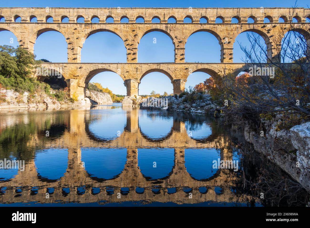 The Pont du Gard over Gardon river. Ancient Roman three-tiered aqueduct ...