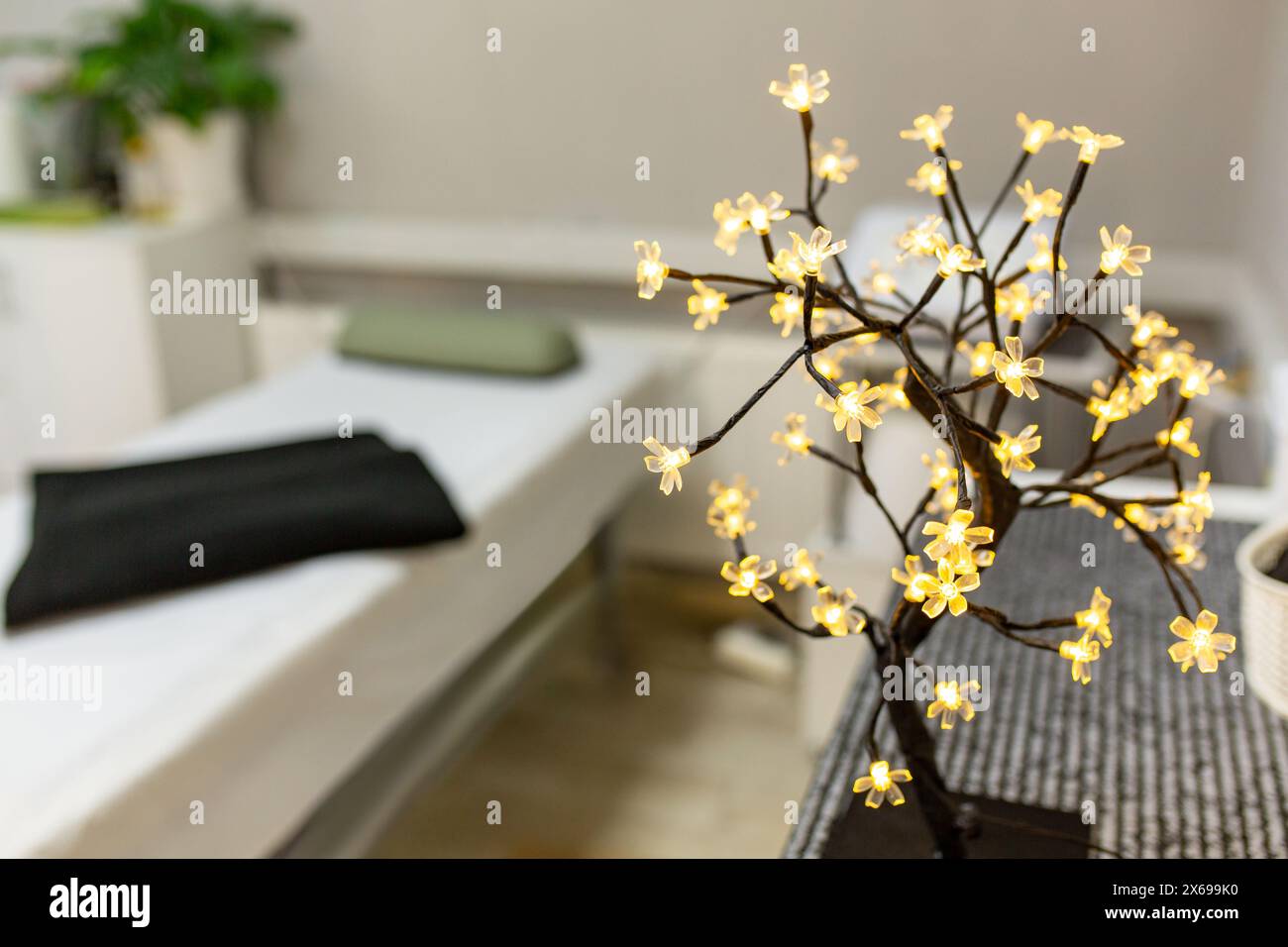 Bright modern massage room interior details, blurred massage couch ...