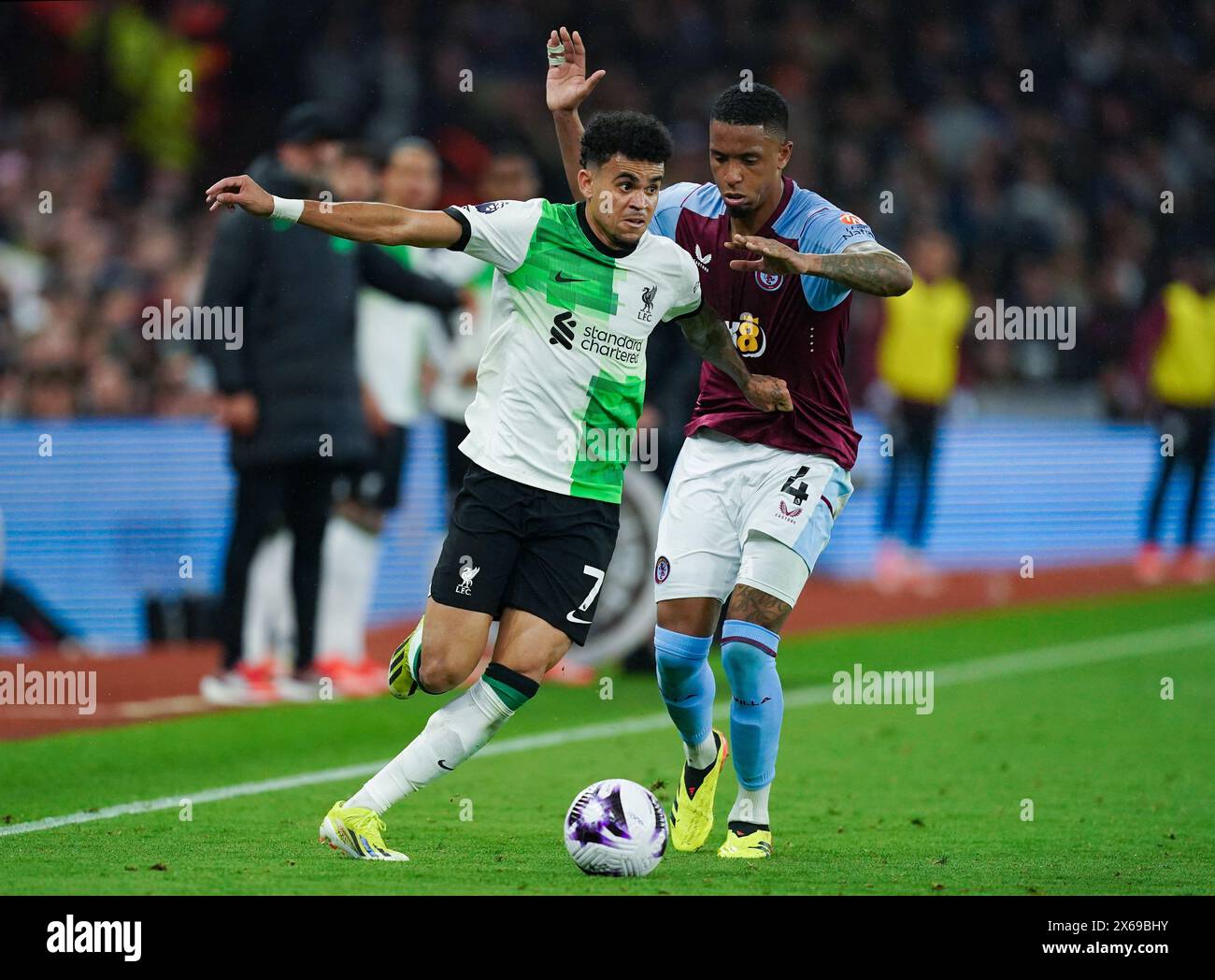 Liverpool's Luis Diaz and Aston Villa's Ezri Konsa (right) during the ...