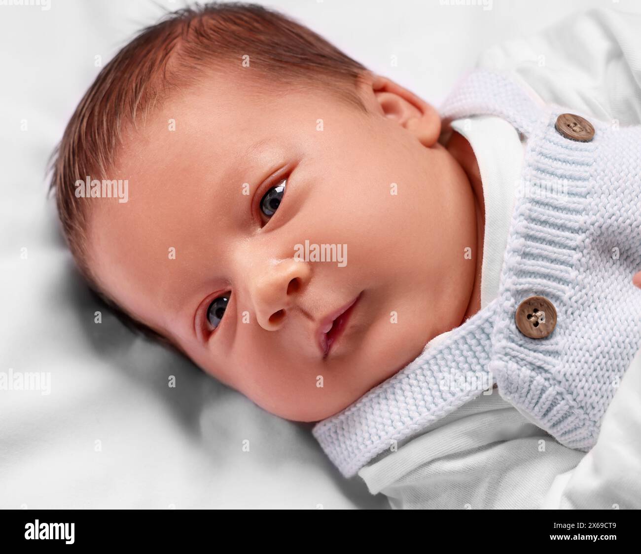 Conjunctivitis. Little baby with red eyes in bed, closeup Stock Photo ...