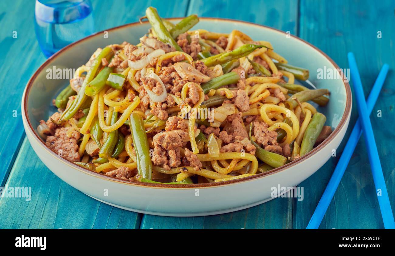 Turkey minced meat stir fry with egg noodles Stock Photo - Alamy