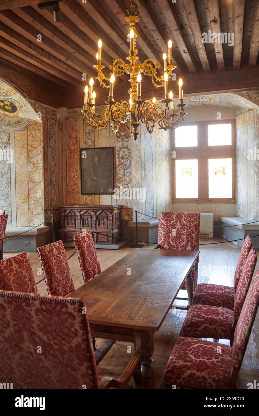 Gruyeres Castle, interior view, table and chairs Stock Photo - Alamy