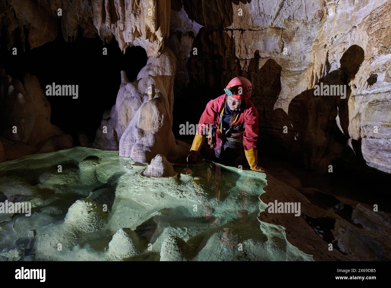Cave explorer with shadow Stock Photo - Alamy