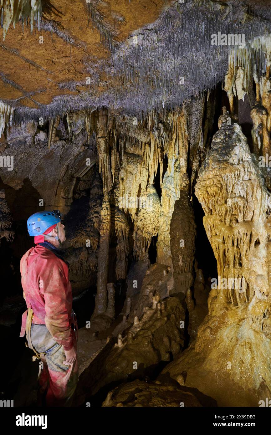 Speleologist in a cave, treasure chamber in the mountain Stock Photo ...