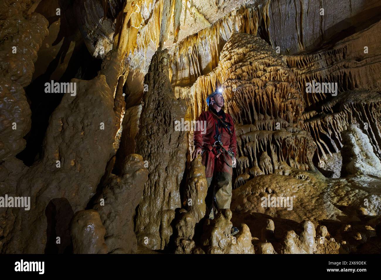 Speleologist in a cave Stock Photo - Alamy