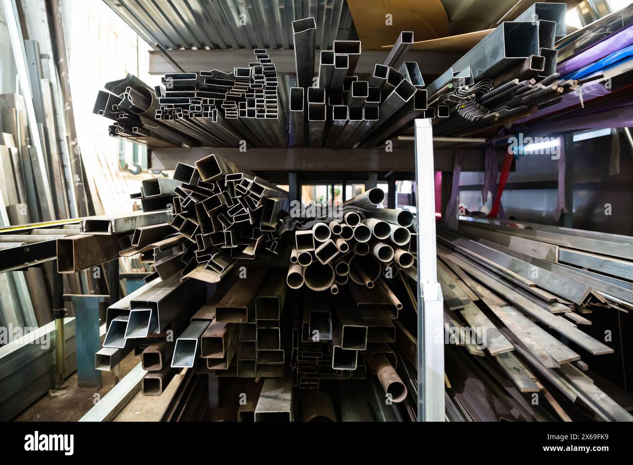 Stack of different metal pipes Stock Photo - Alamy