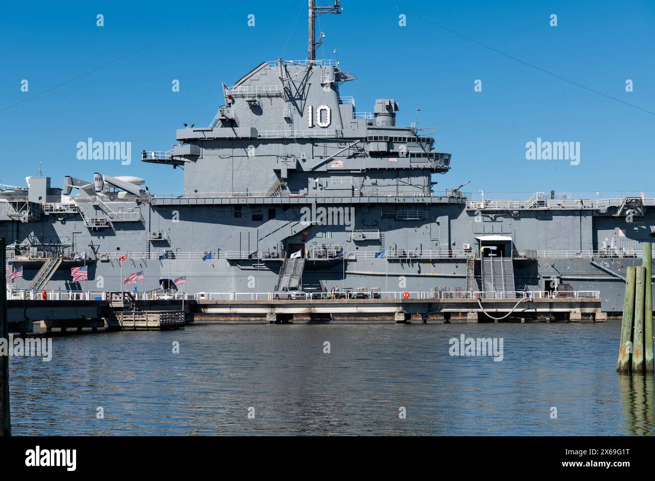 USS Yorktown in dry dock showing midship section with aircraft and ...