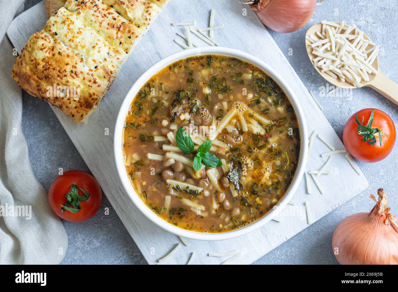 Traditional Turkish thin bar shaped dough soup, homemade noodle soup ...